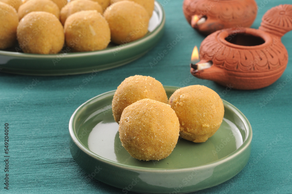 Besan ladoo, an Indian sweet dish made during festivals or celebrations ...