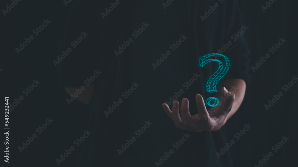 the concept of thinking creating with question, question mark. a man ...