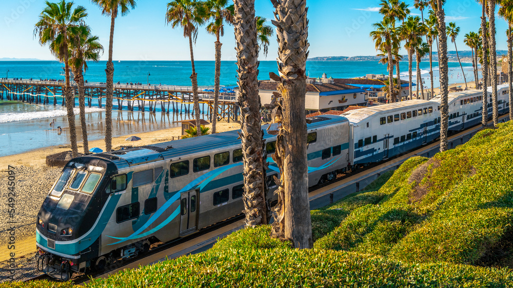 Metro commuter train entering San Clemente Pier Beach Station in ...