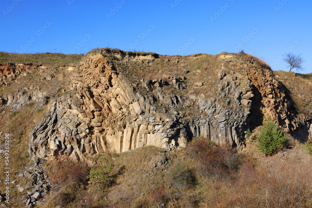 Columns of basalt from Racos are the result of volcanic activity who ...