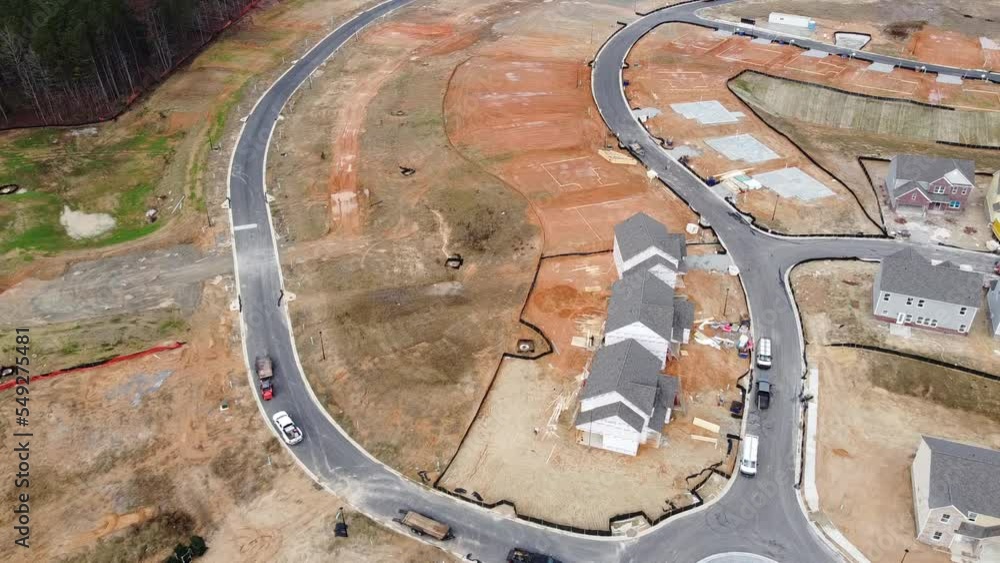 Fly over a new subdivision planning, residential street and lot size ...