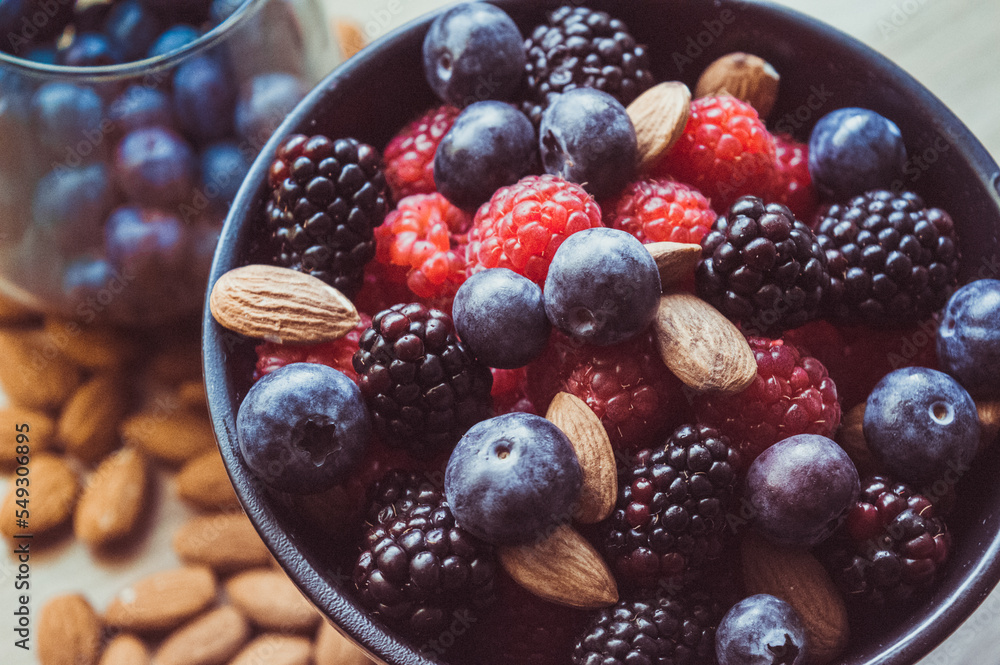 mix de frutos rojos y almendras. Stock Photo | Adobe Stock