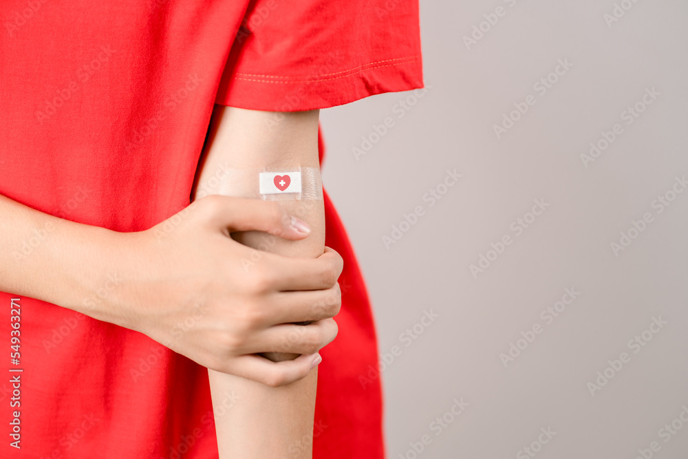 woman showing plaster after donation blood, blood transfusion, world ...