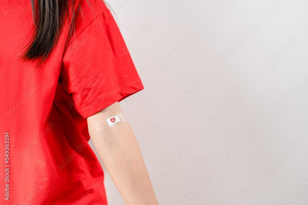 woman showing plaster after donation blood, blood transfusion, world ...