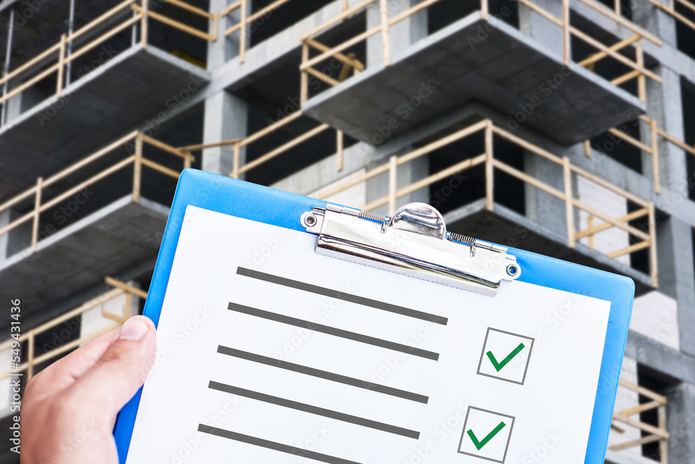 Construction acceptance background. Checking building form. Bricks and ...