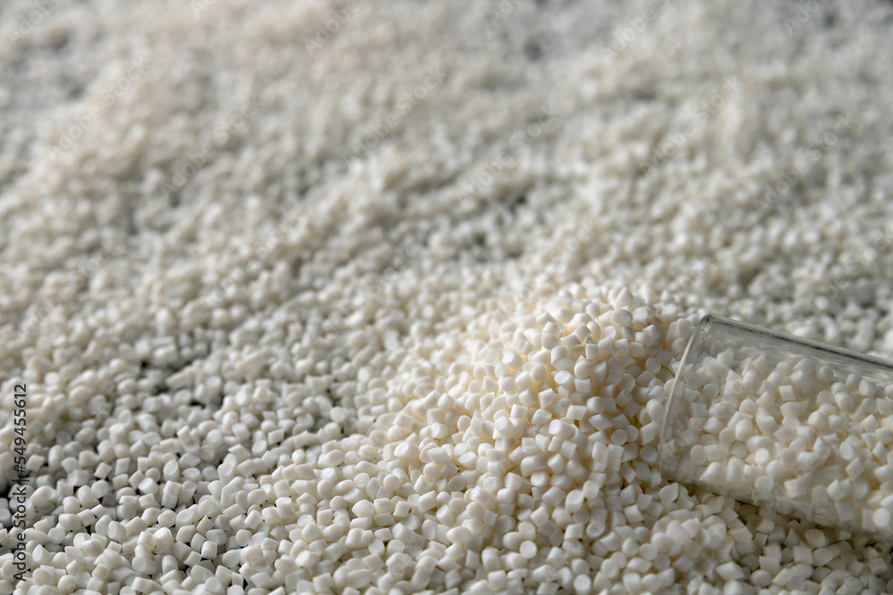 Close-up of plastic polymer granules, hand hold Polymer pellet, polymer ...