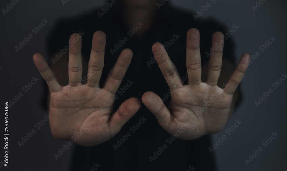 male hand showing stop gesture Concept of stop violence. Warning ...