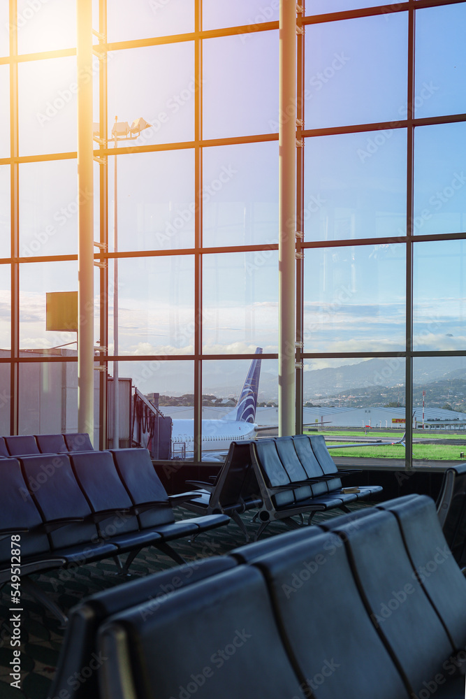 Waiting For Transfer At Airport Passengers waiting at airport terminal ...