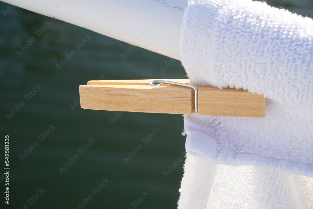 clothespin that fixes the laundry to the washing line. Simple system ...
