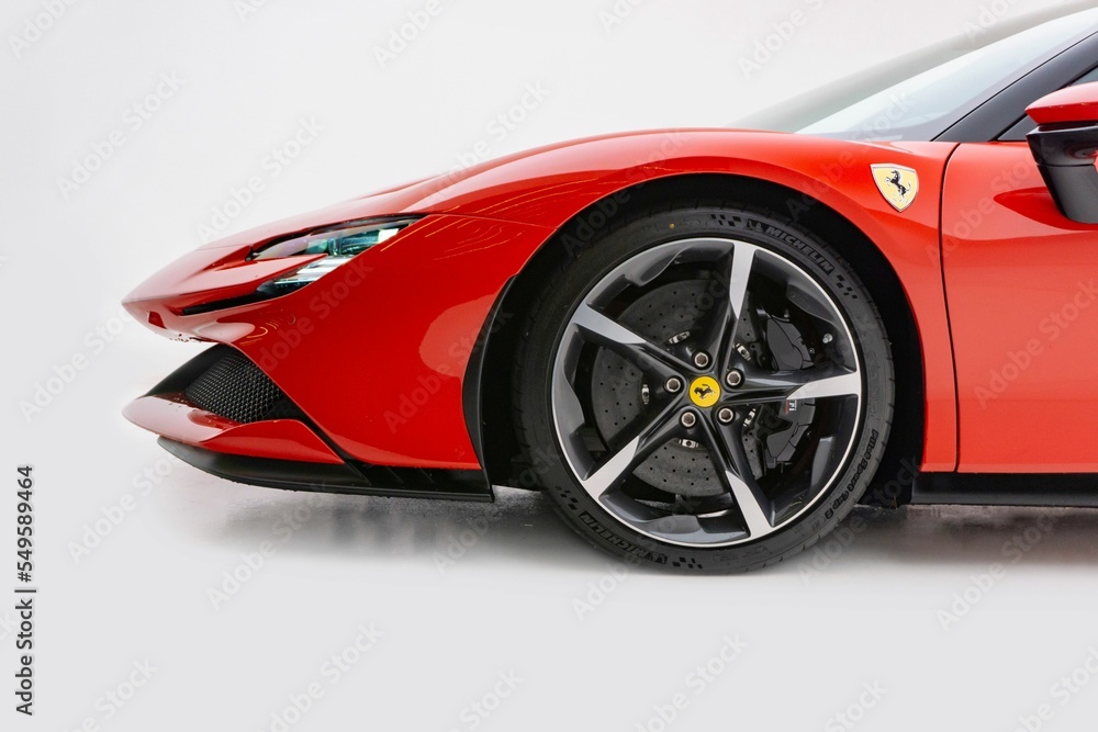 Front end of a red Ferrari SF90 Stradale in a studio, on white ...