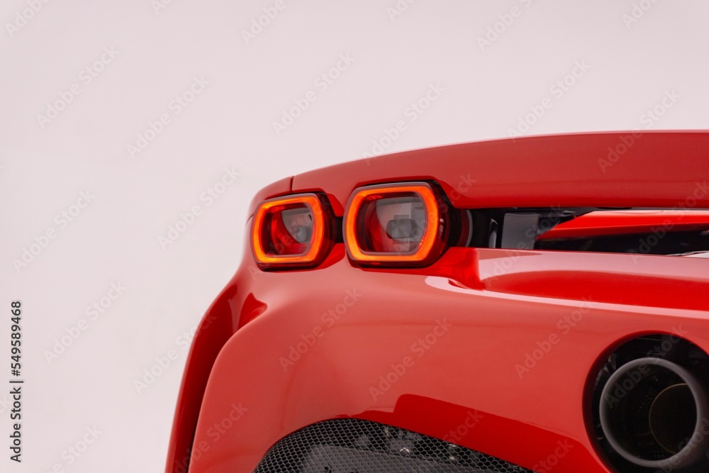 Taillights of a red Ferrari SF90 Stradale in a studio, on white ...