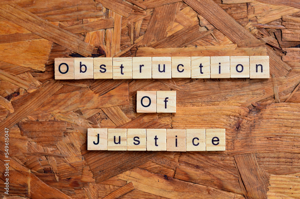 Obstruction of justice text om wooden square, law quotes Stock Photo ...