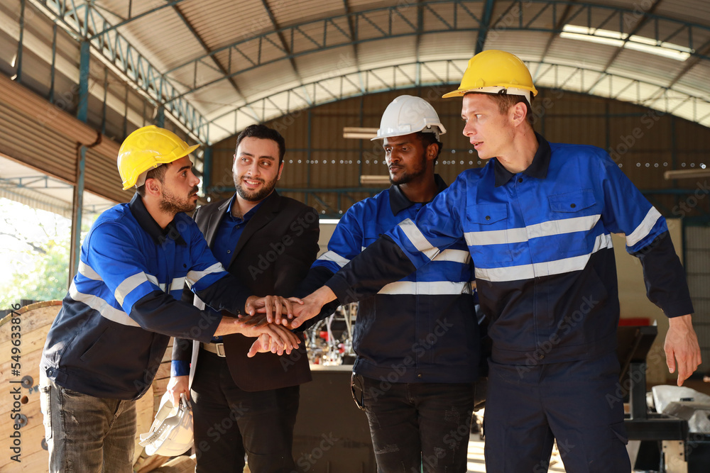 Group of technician engineer and businessman in protective uniform with ...
