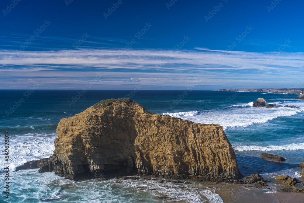 spectacular cliffs, sharp rocks, wild beaches and big waves on the ...
