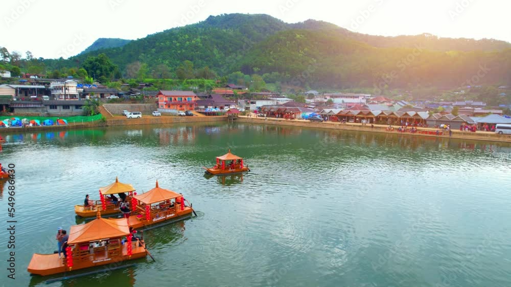 Drone is flying over a Chinese village in Thailand, “Ban Rak Thai” Lake ...