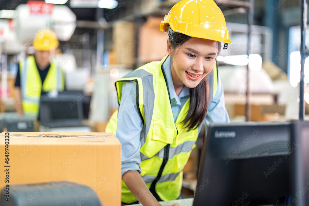 Cashier girl working in ware house calculation payment and stock ...