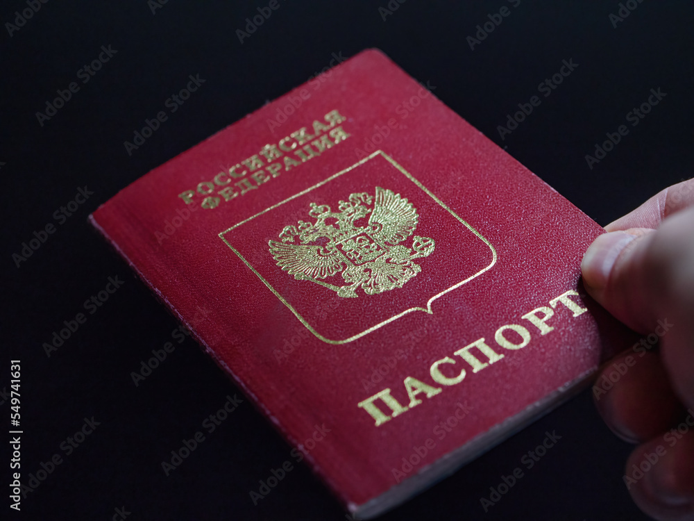 Russian passport on black background Stock Photo | Adobe Stock