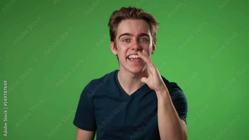 Portrait of happy young man 20s smiling scream and shout calling waving ...