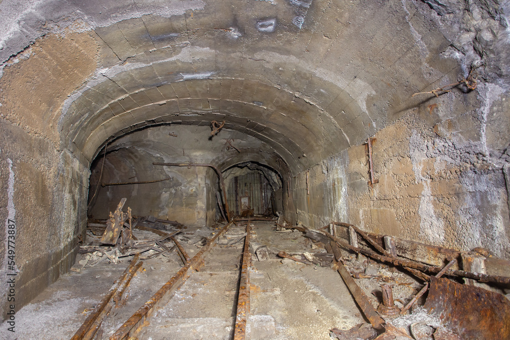 Old gold mine underground tunnel shelter bunker with concrete lining ...