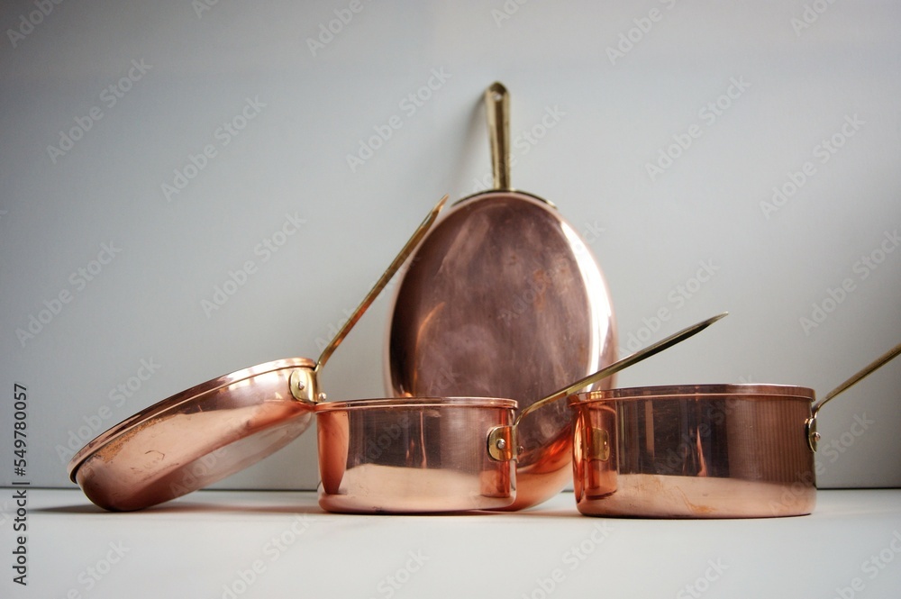 Vintage copper pans Stock Photo | Adobe Stock