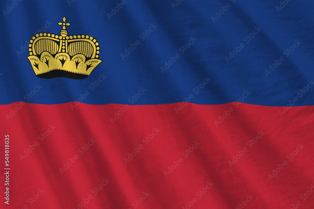 Liechtenstein flag with big folds waving close up under the studio ...