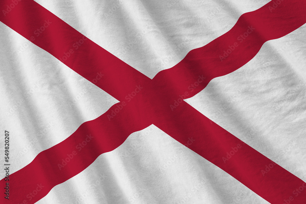 Alabama US state flag with big folds waving close up under the studio ...
