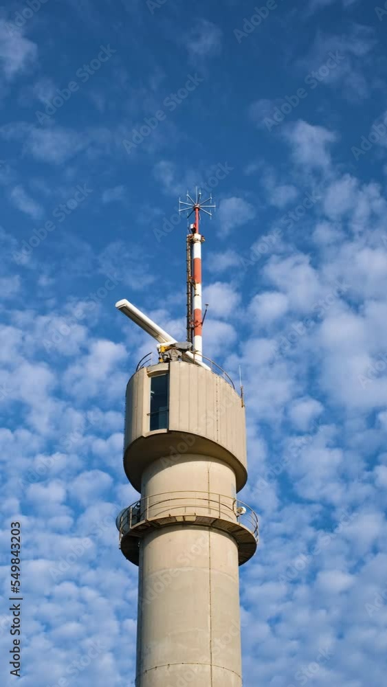 A working modern marine radar station located in a sea small concrete ...