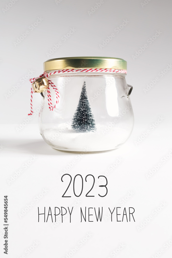 2023 Happy New Year message with Christmas tree in a glass Jar Stock ...