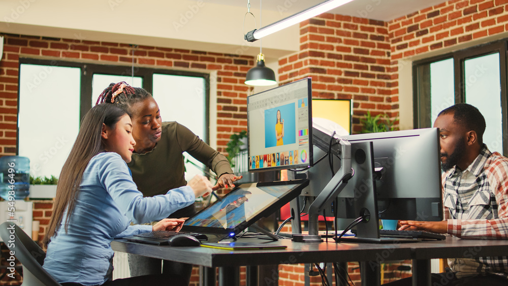 Diverse photo editors retouching pictures with editing software ...