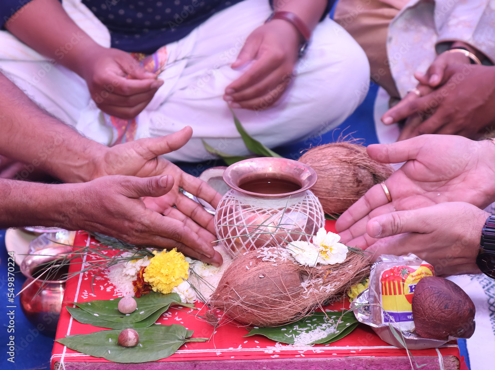 Performing Kalash puja rituals in Indian traditional wedding ceremony ...