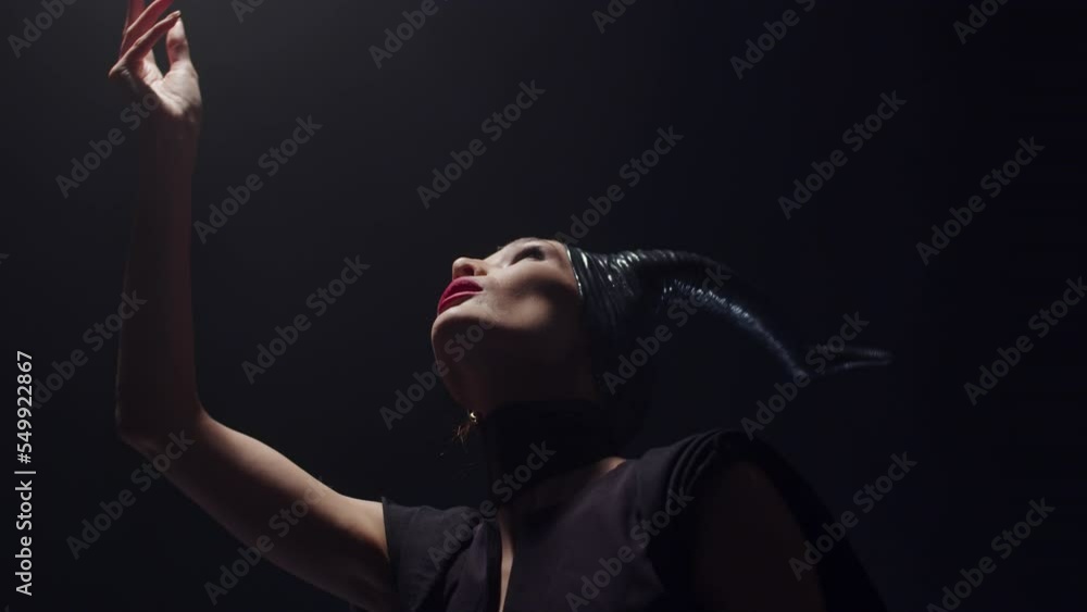 Bottom view an evil beautiful female witch villain from a fairy tale ...