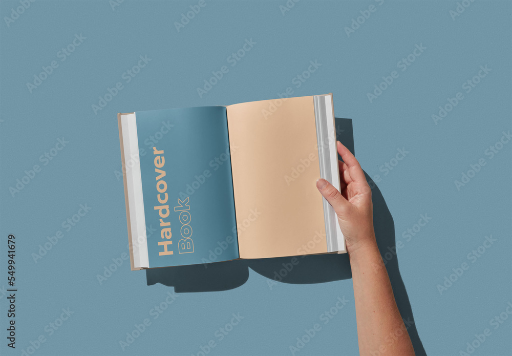 Hand Holding an Open Hardcover Book Mockup With Custom Background Stock ...
