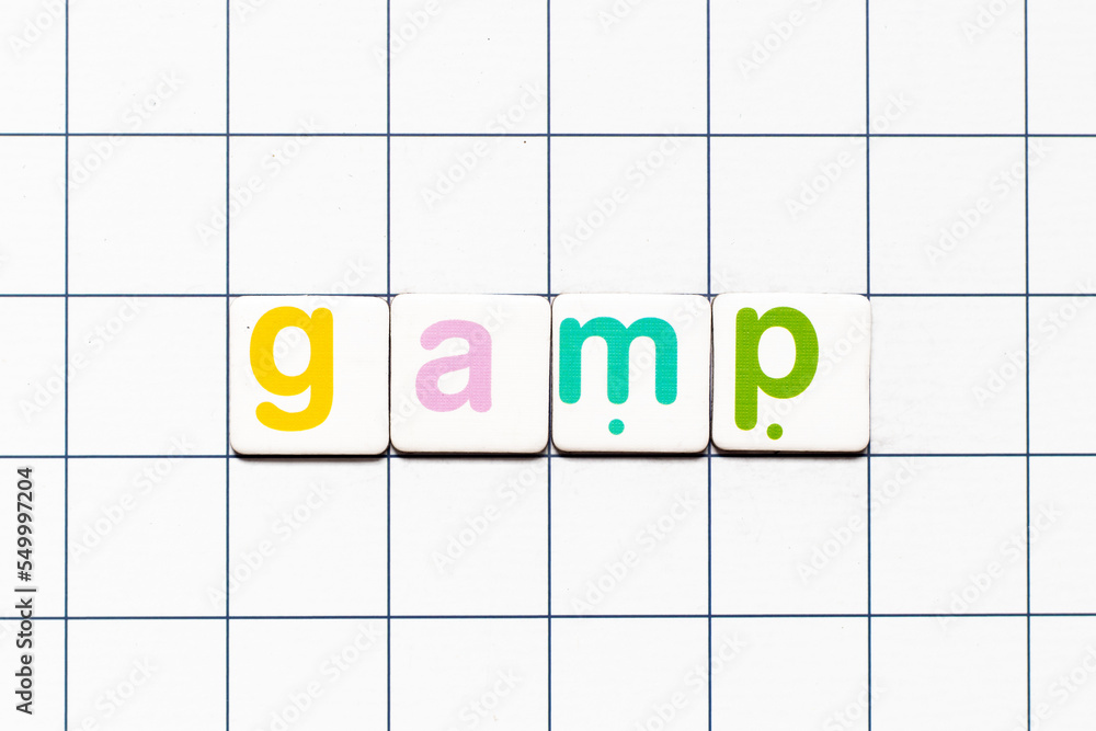 Colorful tile letter in word GAMP (Abbreviation of Good Automated ...