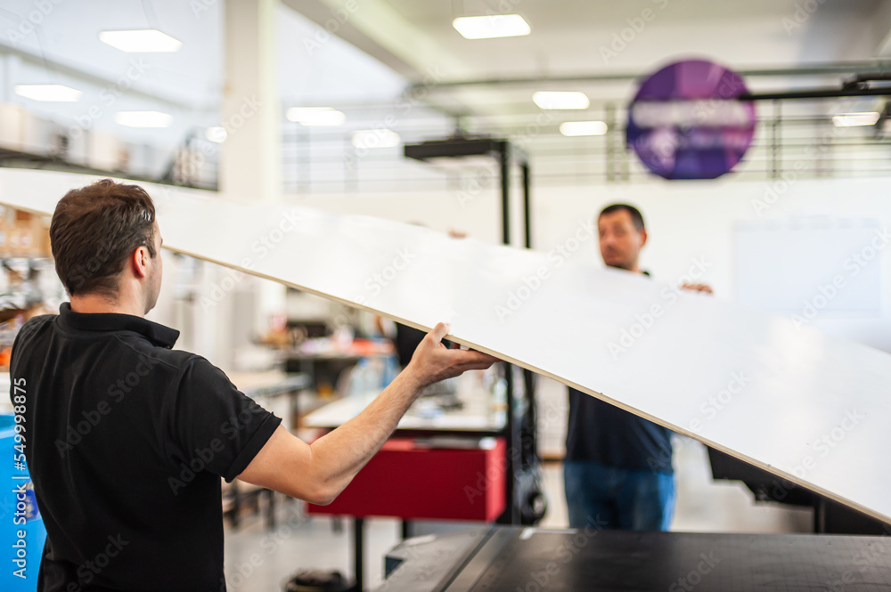 Stockfoto Professional workers graphic technicians operators work in a ...