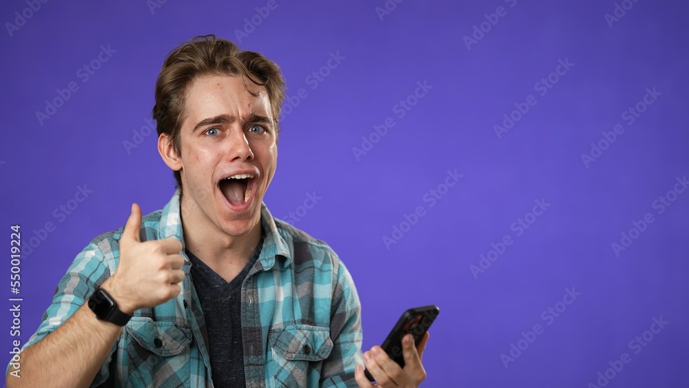 Off center portrait of promoter fun hold use mobile cell phone give ...