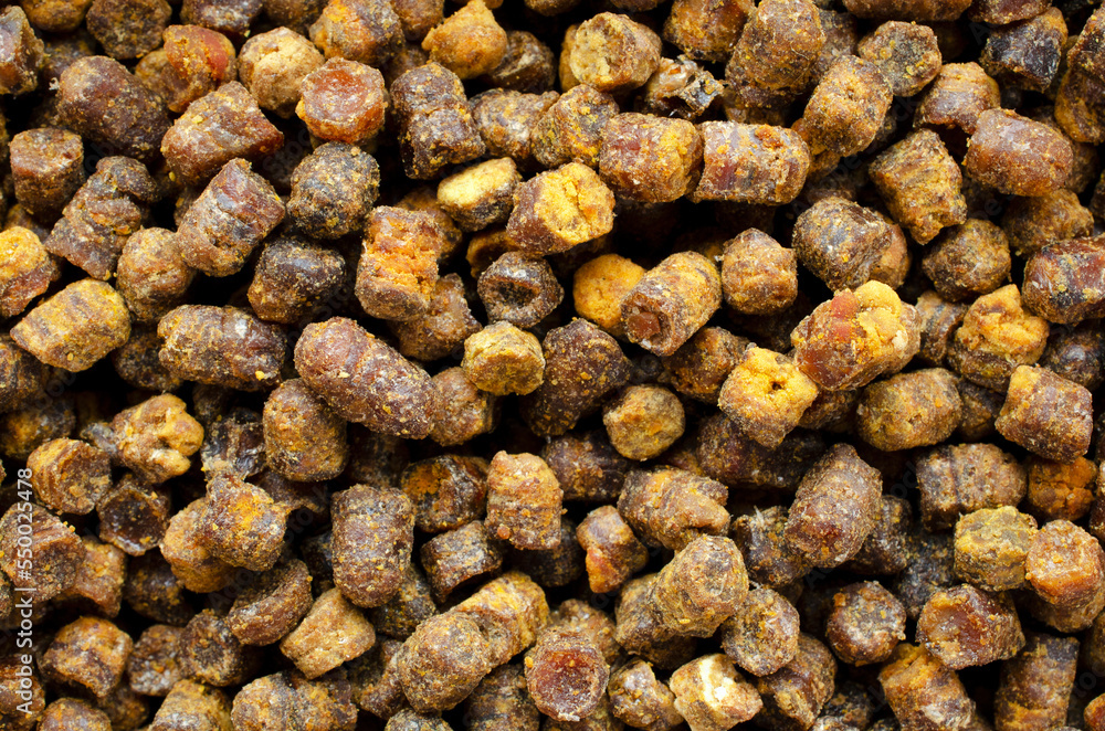 Top view of bee pollen. Bee perga, background, texture. Perga top view ...