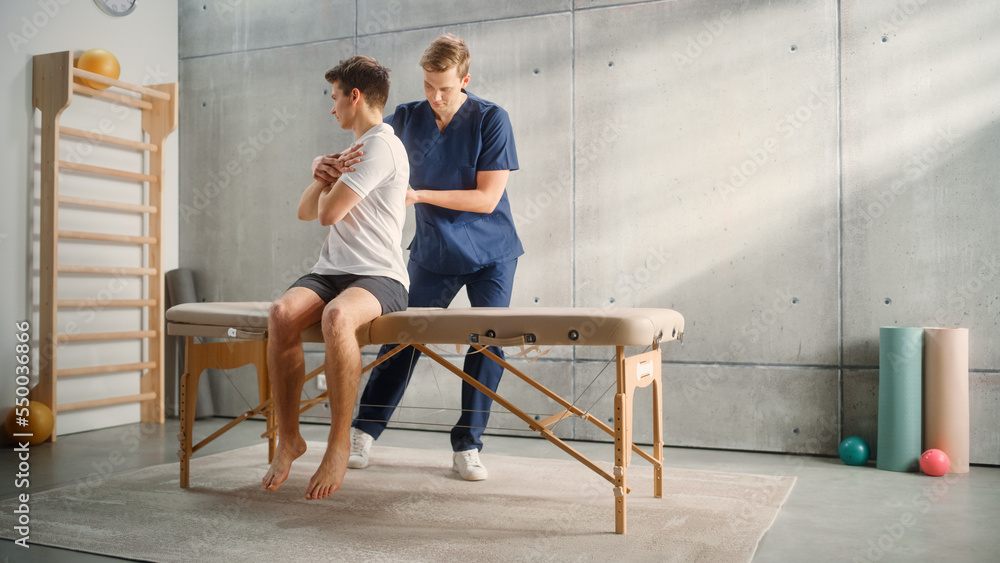 Professional Sport Physiotherapist Working on Specific Muscle Groups ...