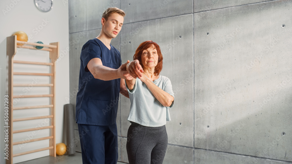 Professional Sport Physiotherapist Working on Specific Muscle Groups ...