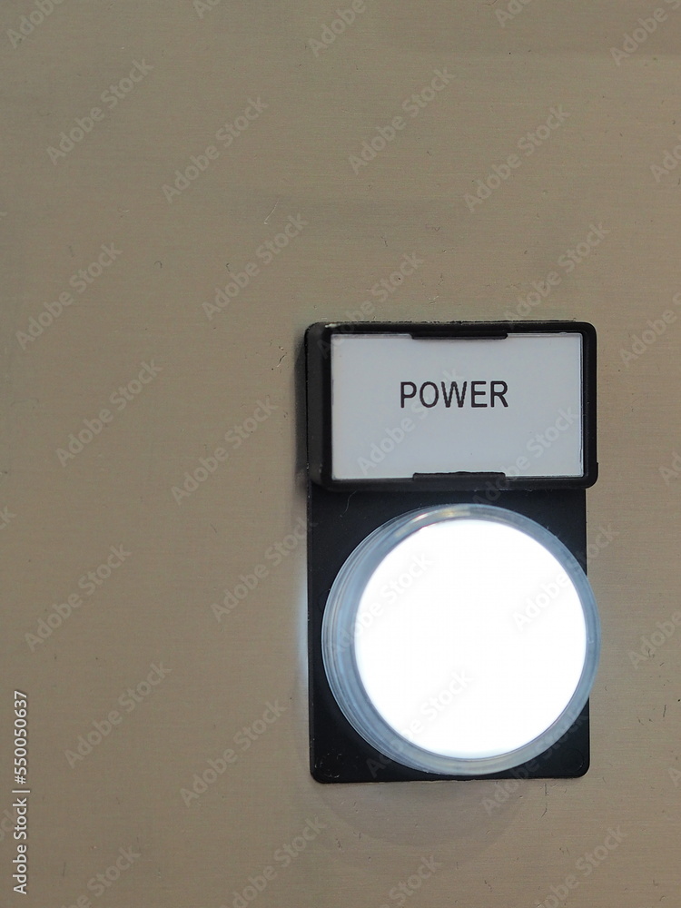 Illuminated and labelled power button on a machine Stock Photo | Adobe ...