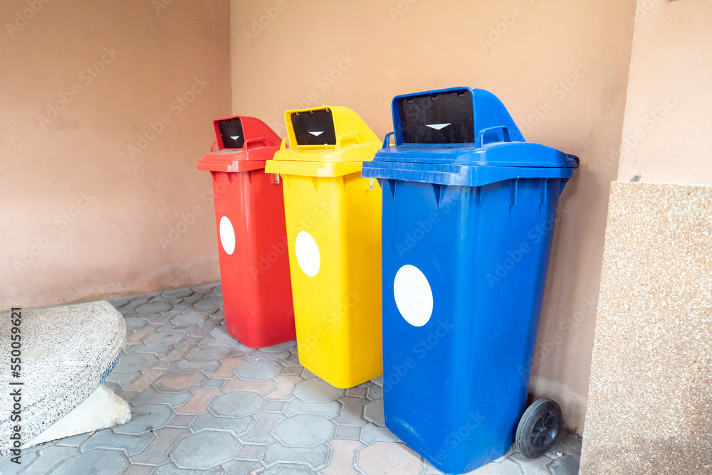 Color-segregated bins for proper waste separation Stock Photo | Adobe Stock