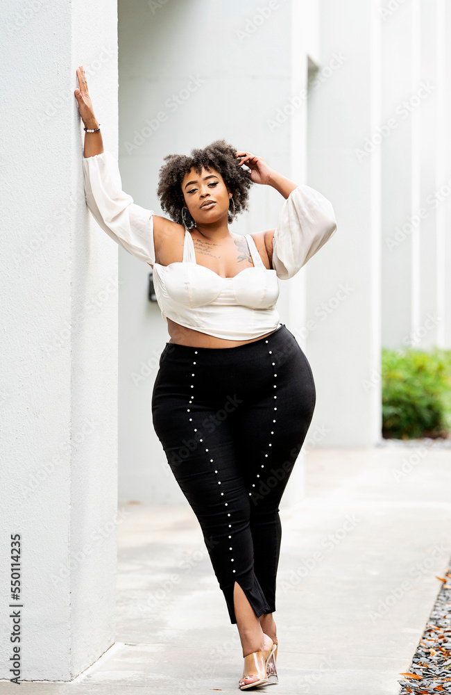Plus size fashion forward Black woman outside Stock Photo | Adobe Stock