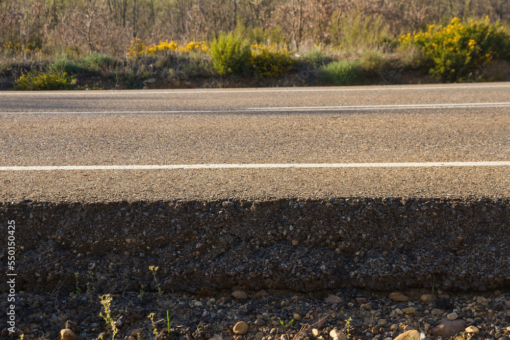Cross sectional view of the asphalt base layer or firm with gravel and ...
