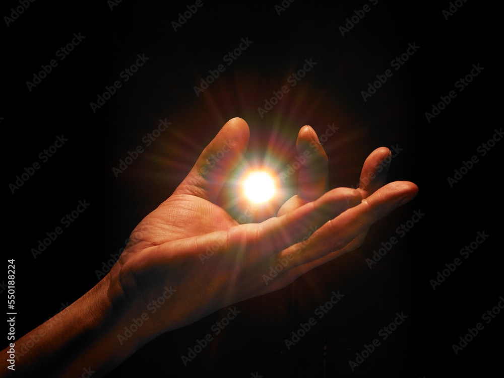 Light power coming out of palm Stock Photo | Adobe Stock