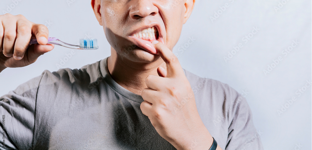 Person with gingivitis holding toothbrush. People holding toothbrush ...