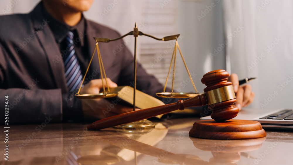 Justice and law concept.Male judge in a courtroom with the gavel ...