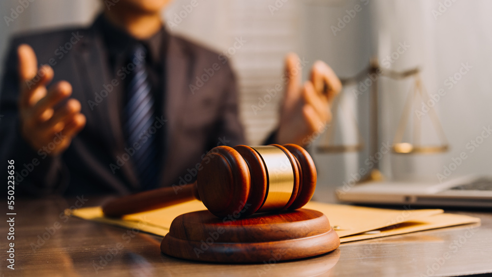 Justice and law concept.Male judge in a courtroom with the gavel ...