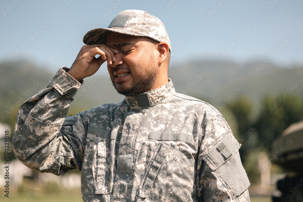 Stressed depressed crying lose war Asian man special forces soldier ...