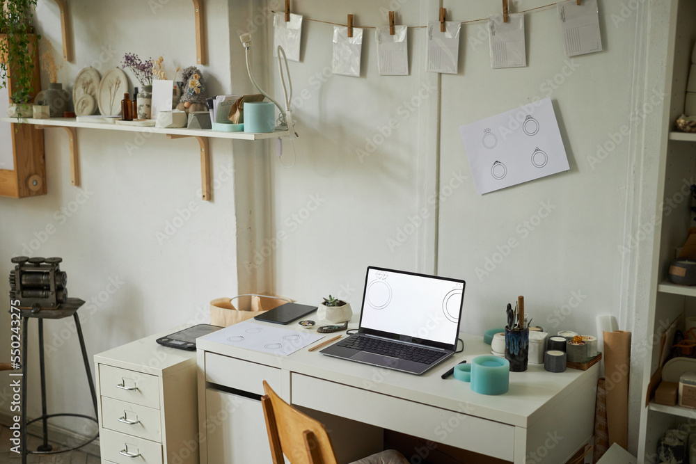 Background image of cozy artists workplace with jewelry designs on ...
