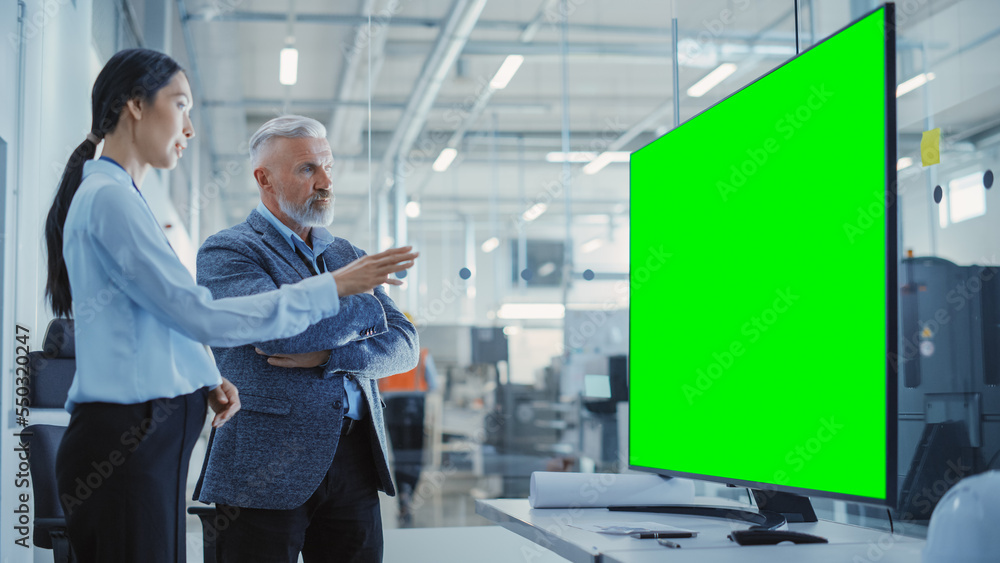 Factory Office Meeting: Chief Engineer Talking with Business Partner in ...