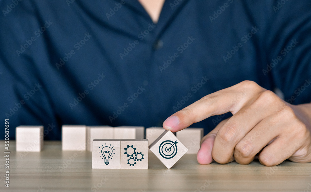 Hand putting virtual target goal and symbol which print screen on ...